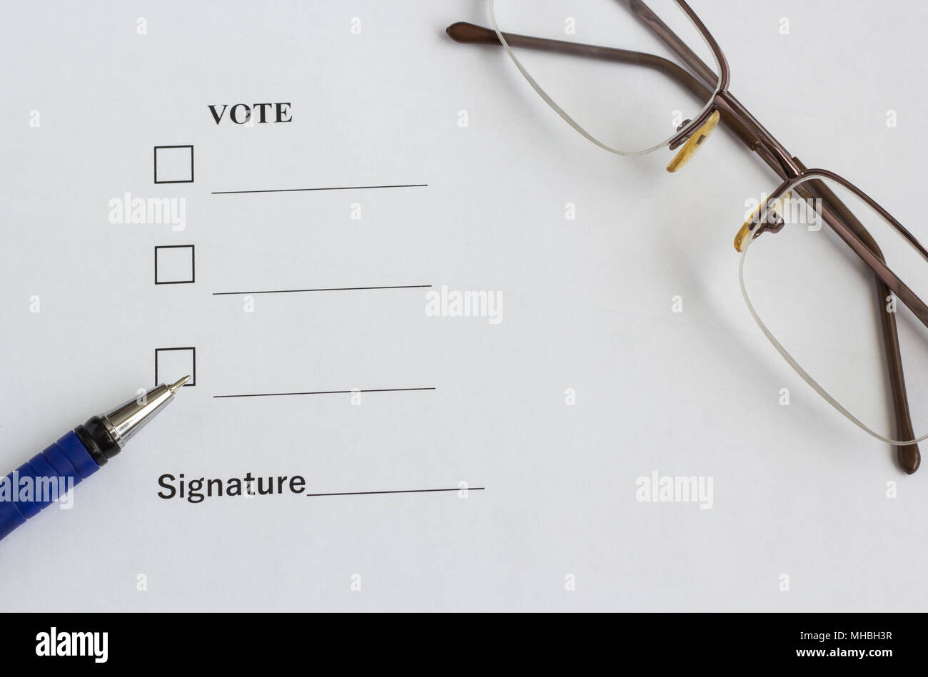 Form for voting and signing near the pen, glasses Stock Photo - Alamy
