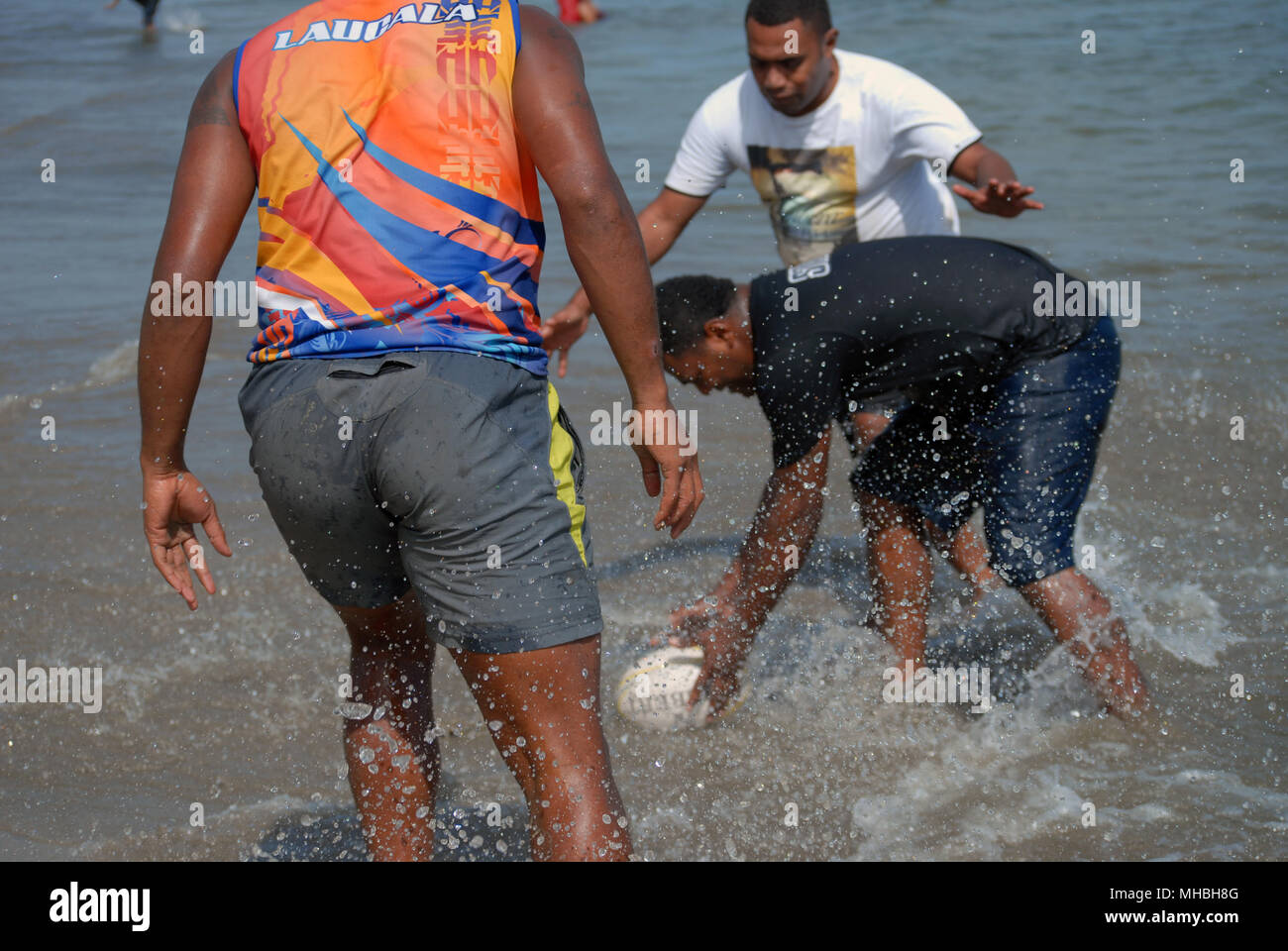 Fijian men playing rugby on Palm Beach, Pacific Harbour, Fiji Stock ...