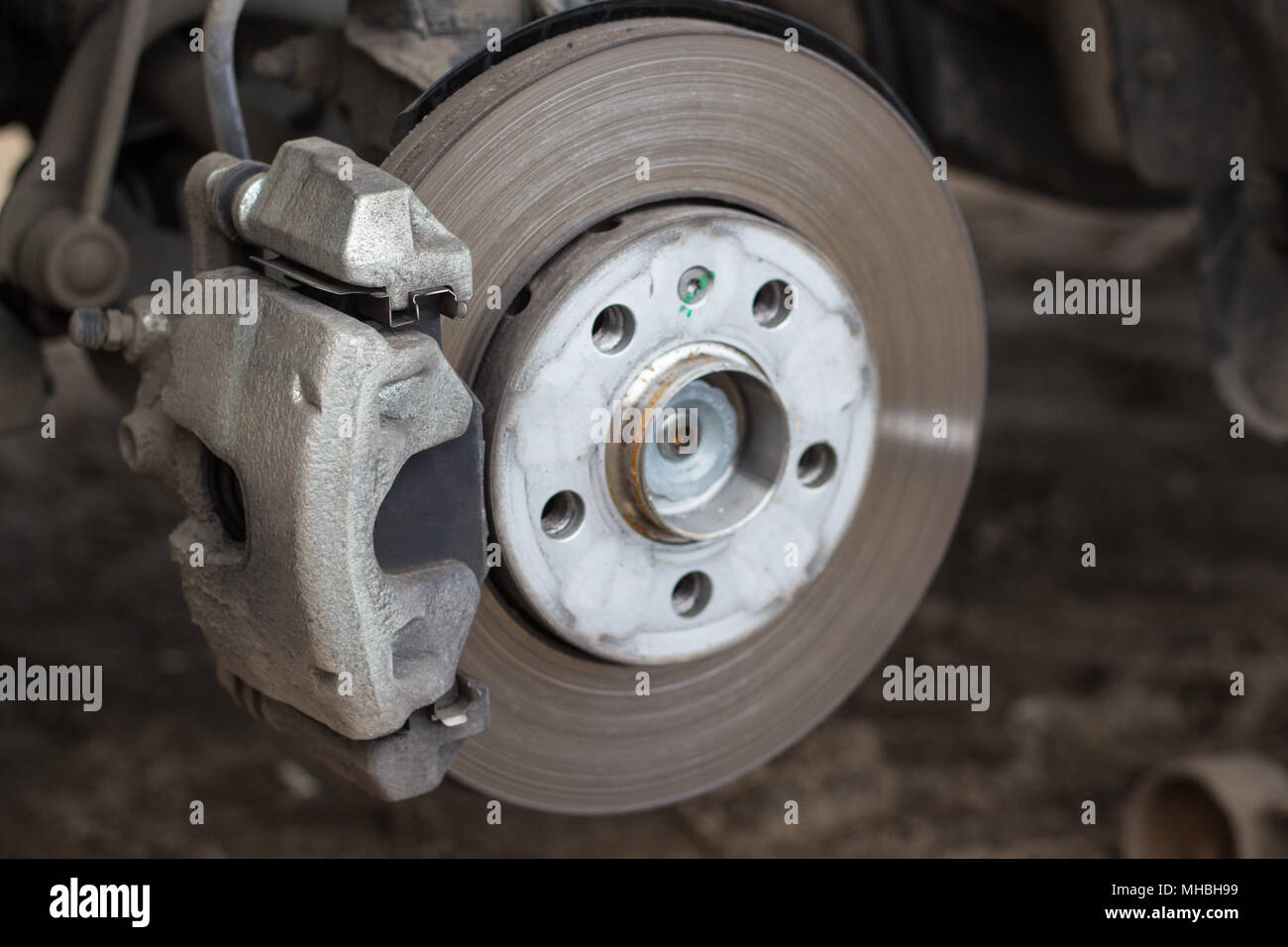 Brake disk and detail of a wheel hub Stock Photo - Alamy