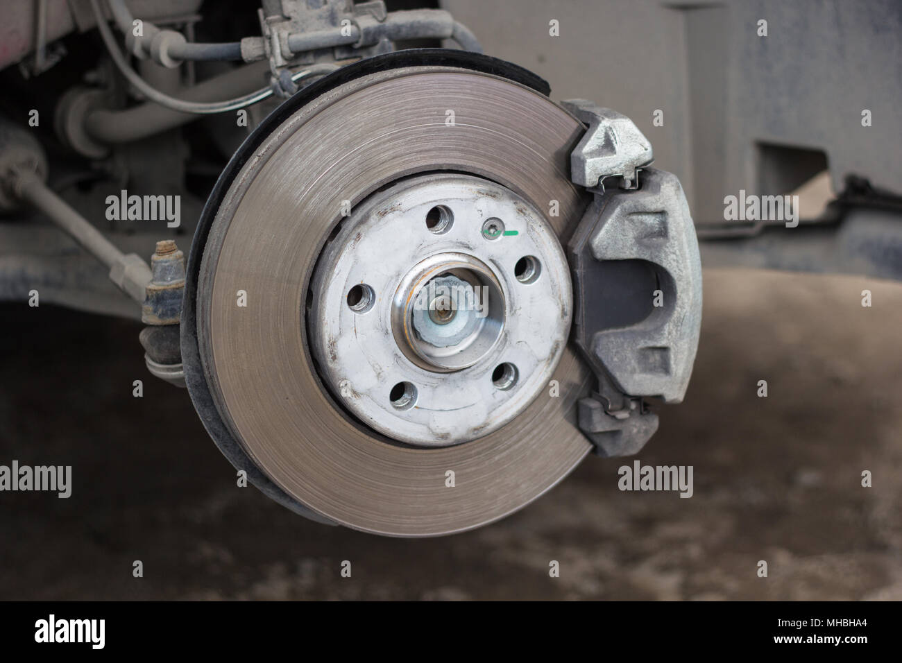 Brake disk and detail of a wheel hub Stock Photo - Alamy