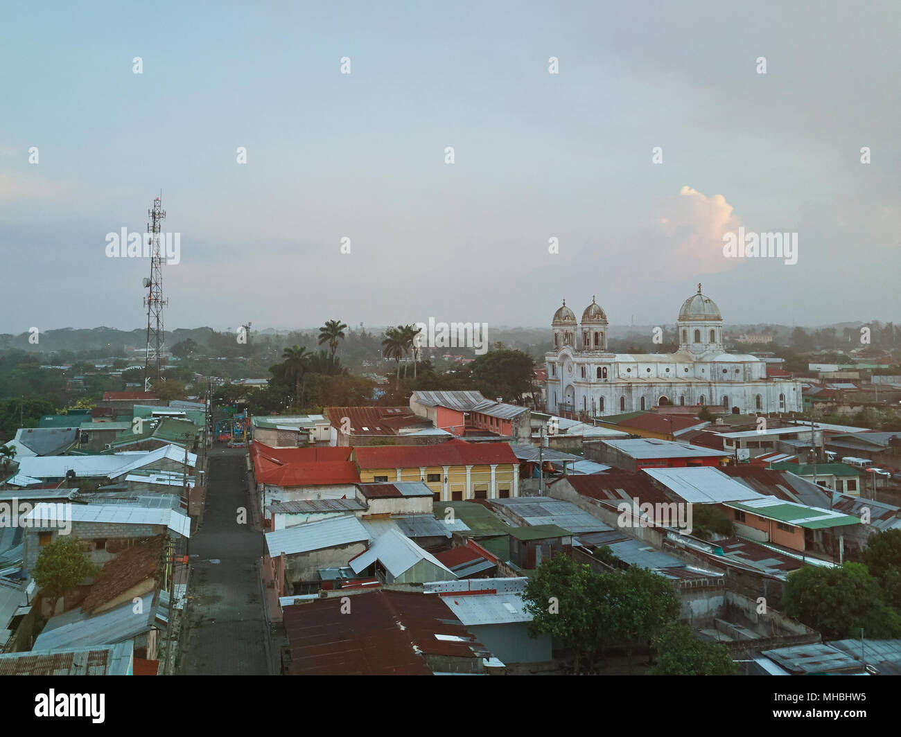 Cityscape of small town aerial drone view. Tropical city landscape ...