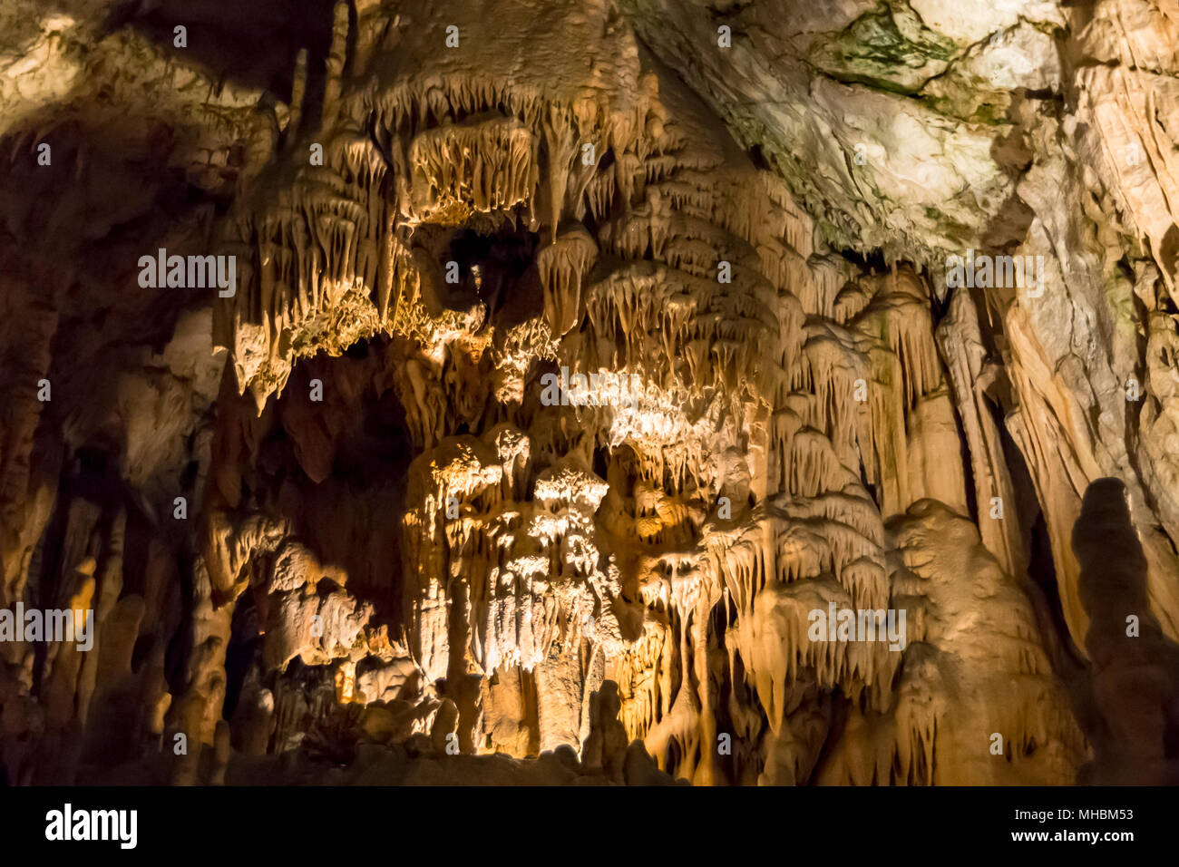 Postojna cave, Slovenia. Formations inside cave with stalactites and ...