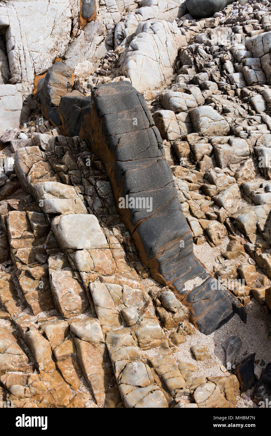 Small dark Palaeogene igneous basalt intrusion in lighter colour ...