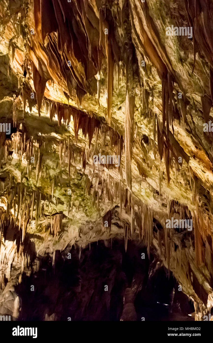 Postojna cave, Slovenia. Formations inside cave with stalactites and ...
