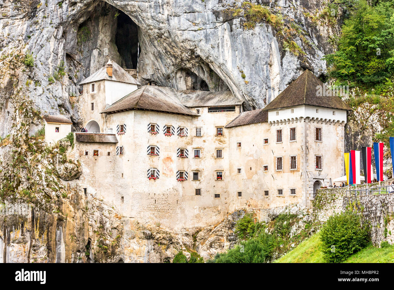 Predjama Castle in Slovenia. Predjama, approximately 9 kilometres from ...