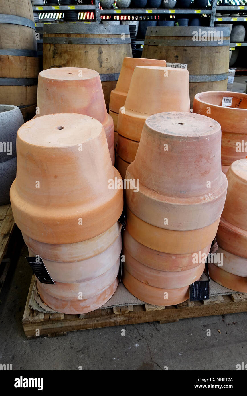 Stack of Terracotta pots on display Stock Photo - Alamy