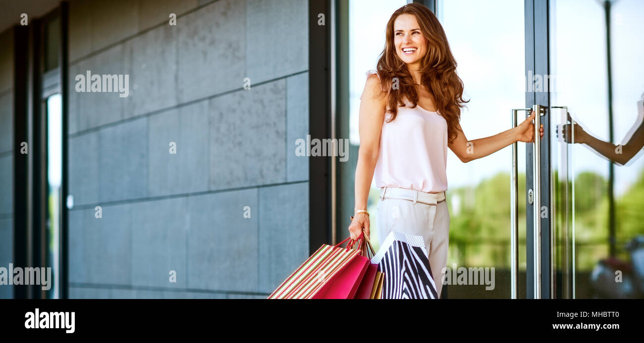 Shopper entering mall hi-res stock photography and images - Alamy