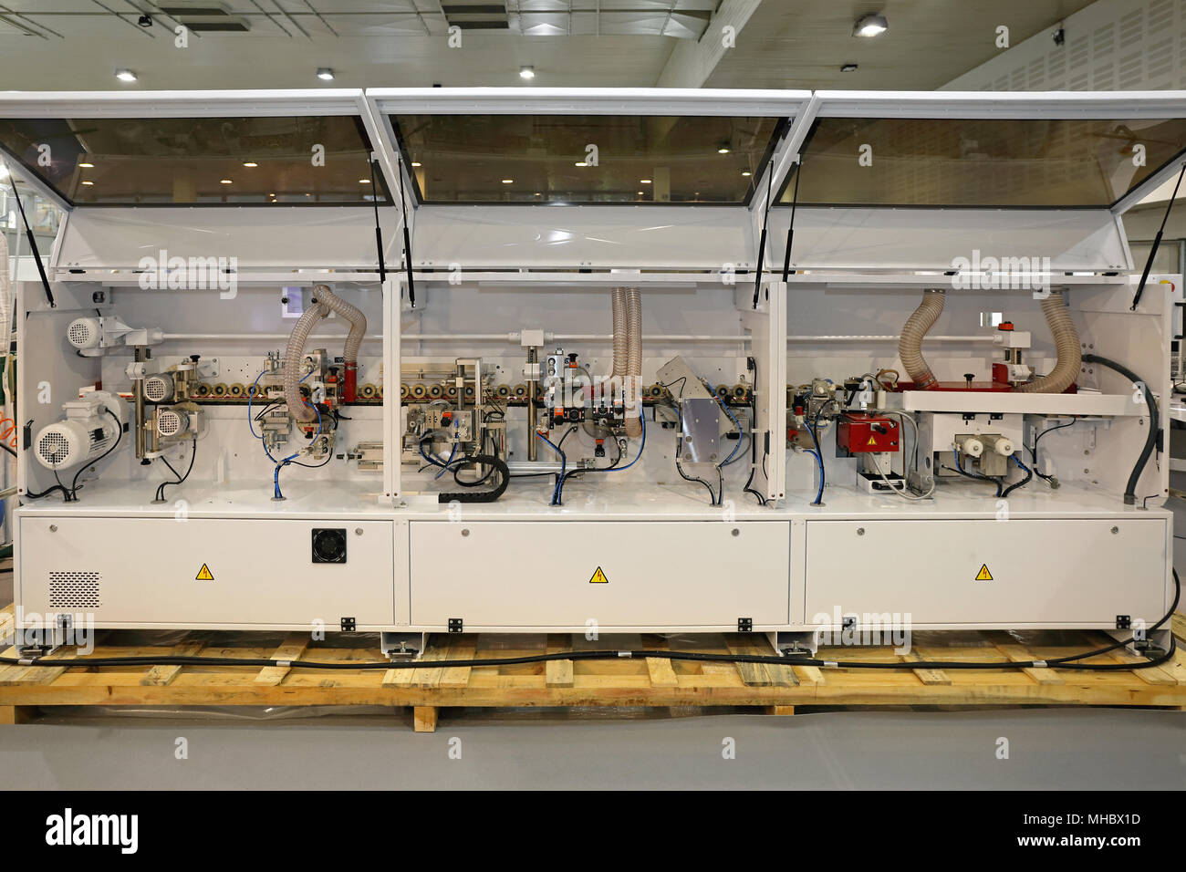 Automated Machine for Plank Boards in Wood Workshop Stock Photo - Alamy