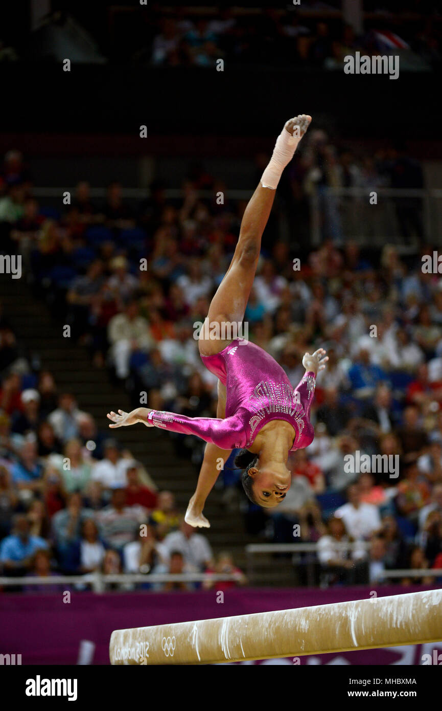 Gabrielle Douglas of the United States competing on the balance beam ...