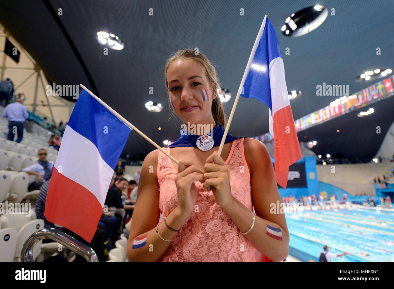 A young french fan at the Swimming venue at the London Olympics Stock ...