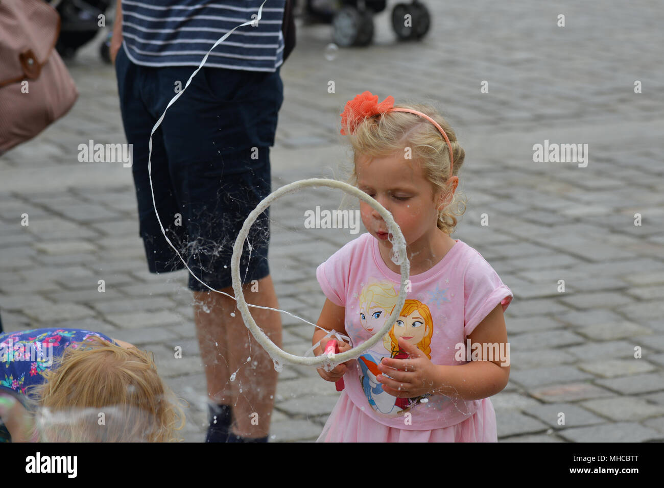 Summer fun, children playing with soap-bubbles in Wroclaw, Poland Stock ...