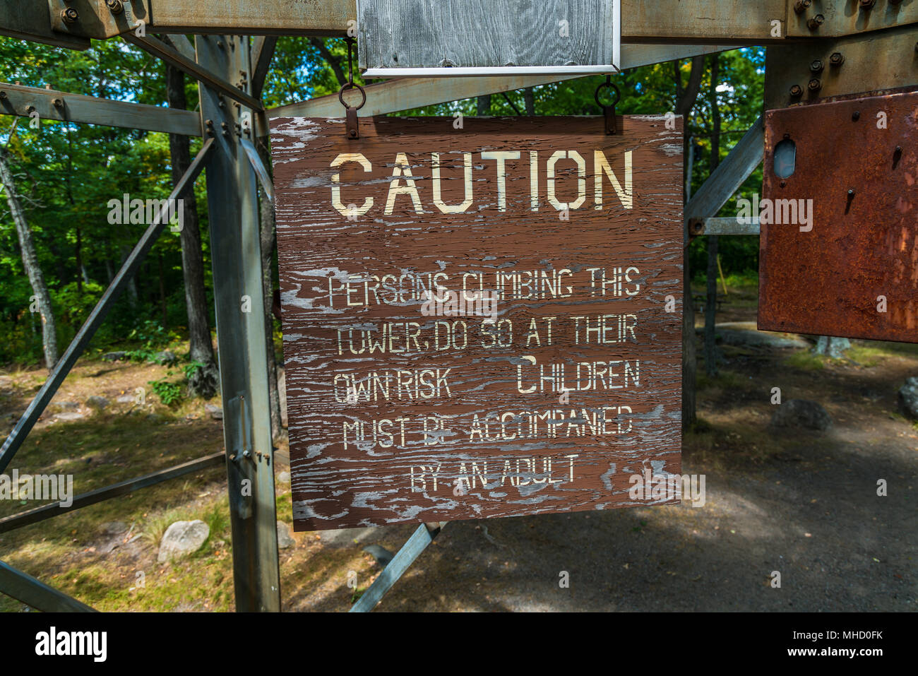 Old wooden, hand painted, caution sign for climbers of lookout tower ...