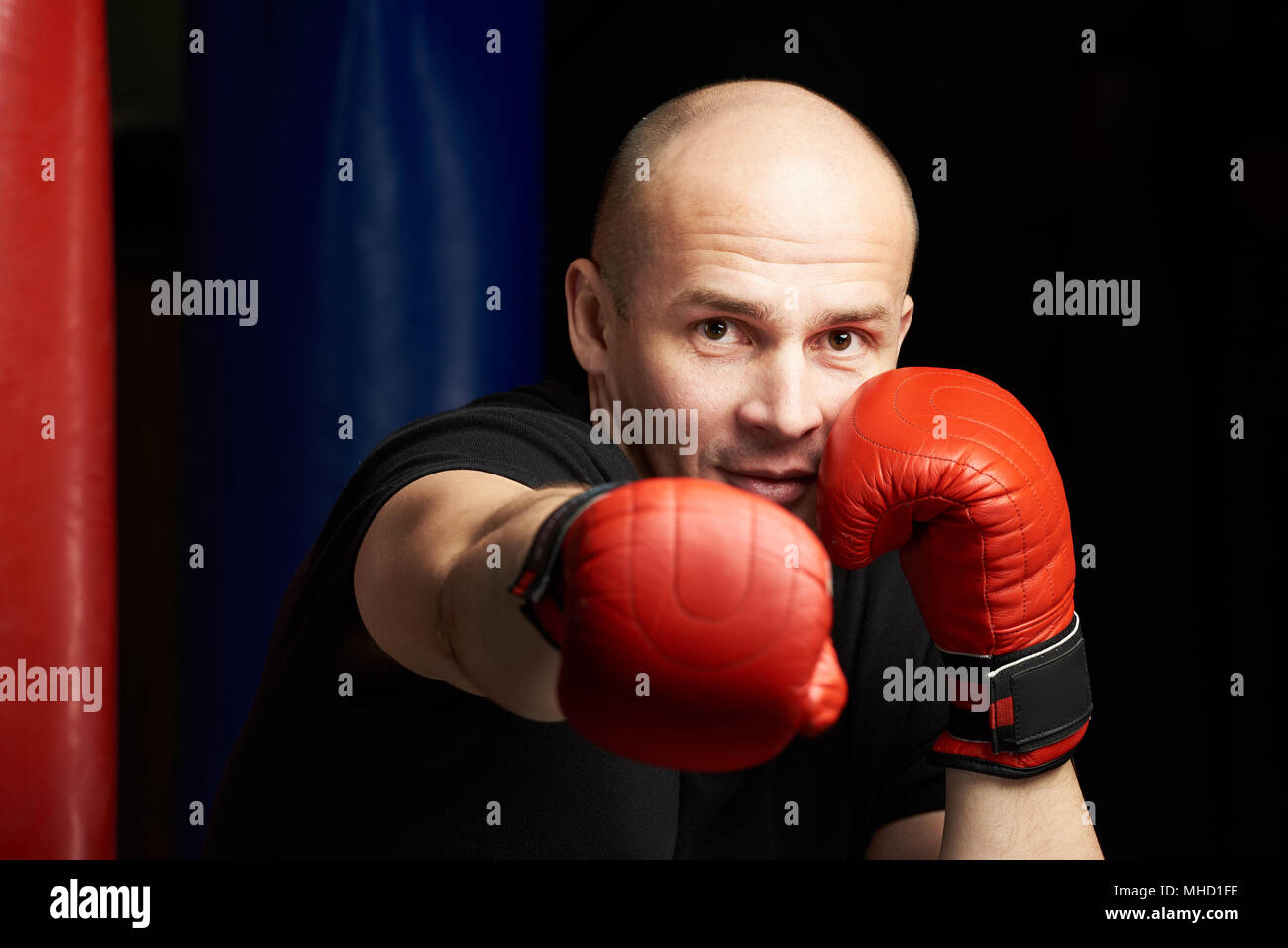 Boxer man in gloves making hi-res stock photography and images - Alamy