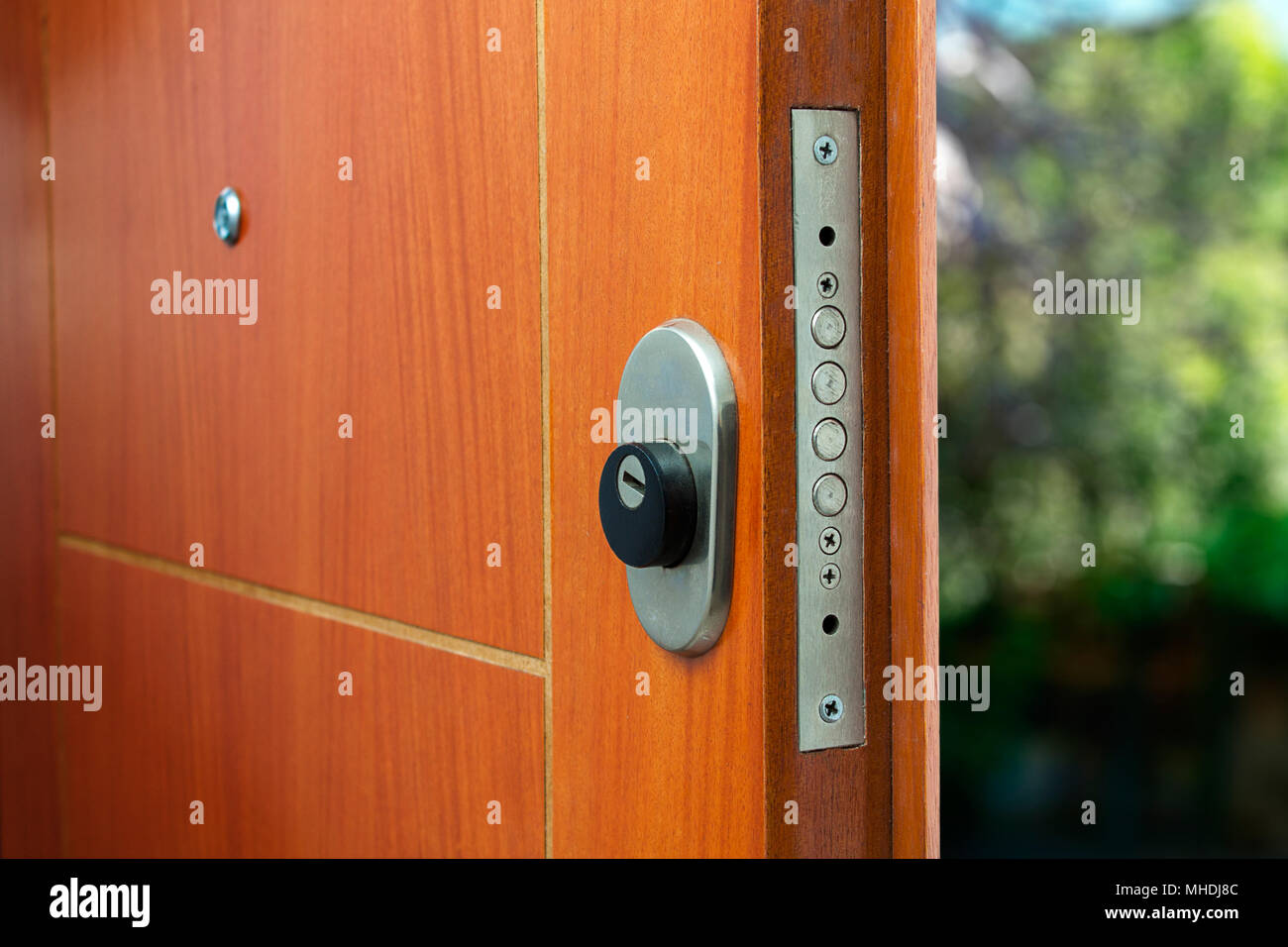 Open door of a family home. Close-up of the lock an armored door Stock ...