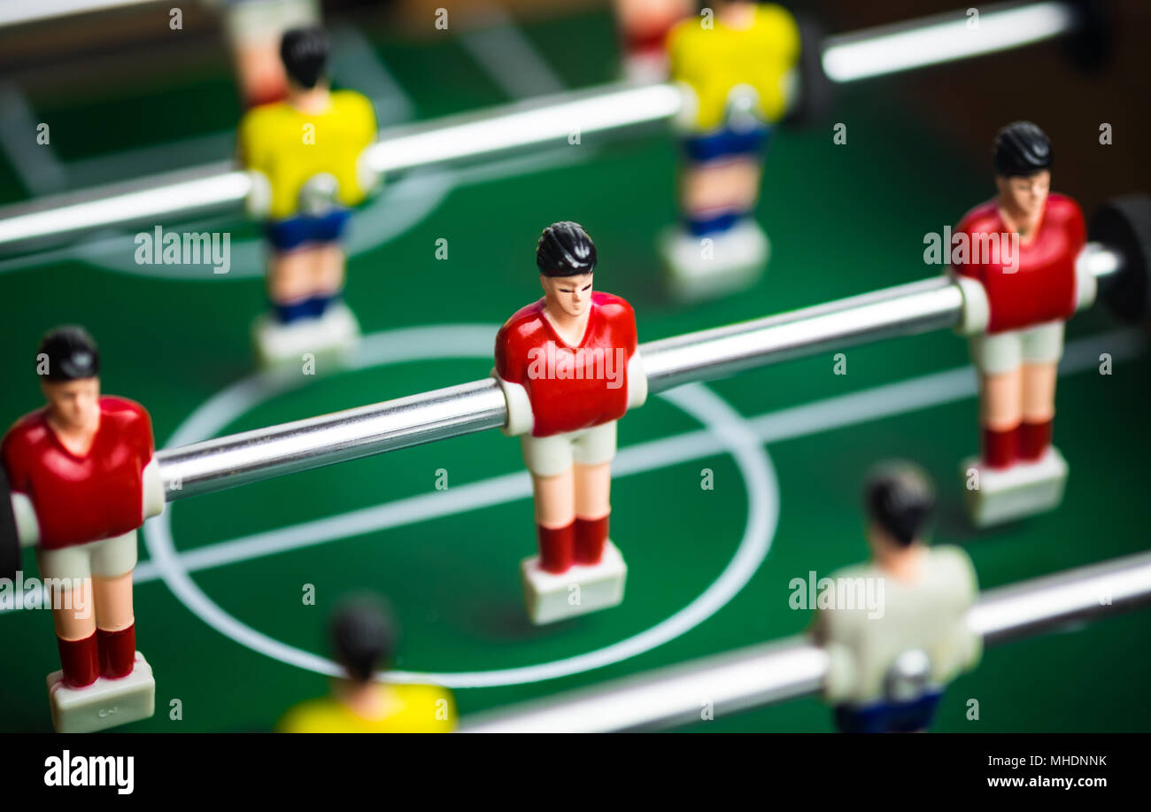 Close up of player on mini football game on table, The concept of ...