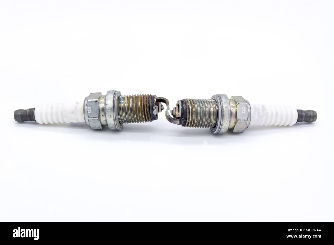 Old spark plug isolated on the white Stock Photo - Alamy