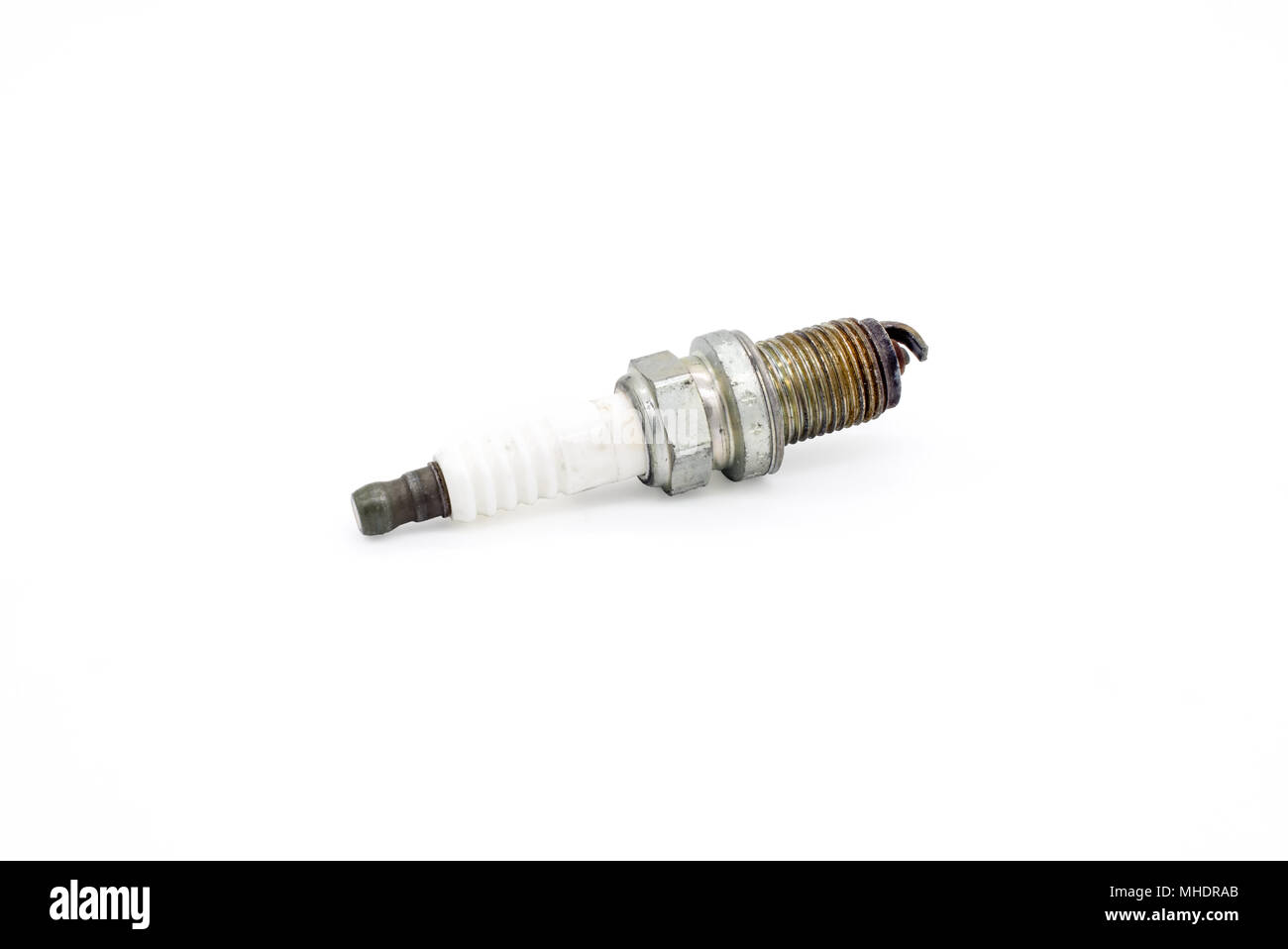 Old spark plug isolated on the white Stock Photo - Alamy