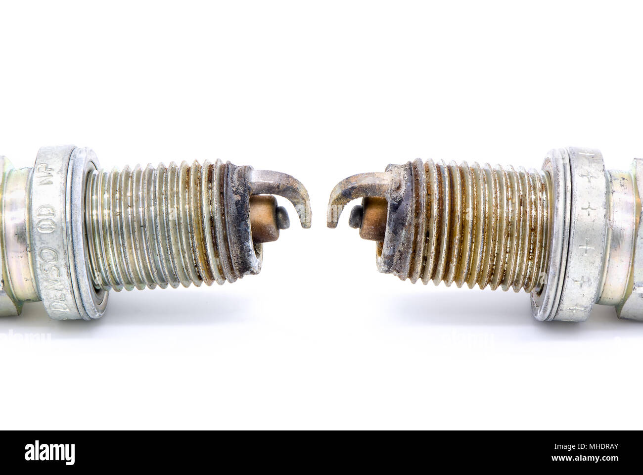 Old spark plug isolated on the white Stock Photo - Alamy