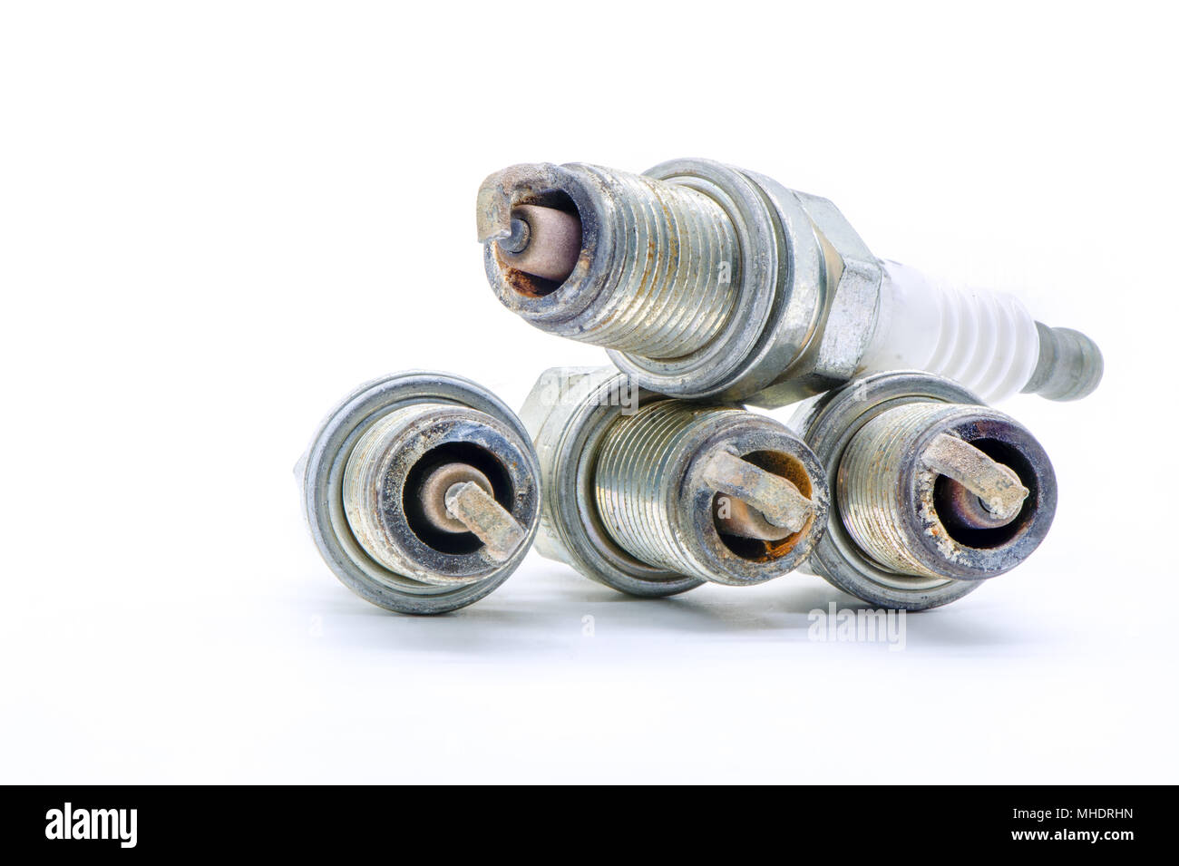 Old spark plug isolated on the white Stock Photo - Alamy