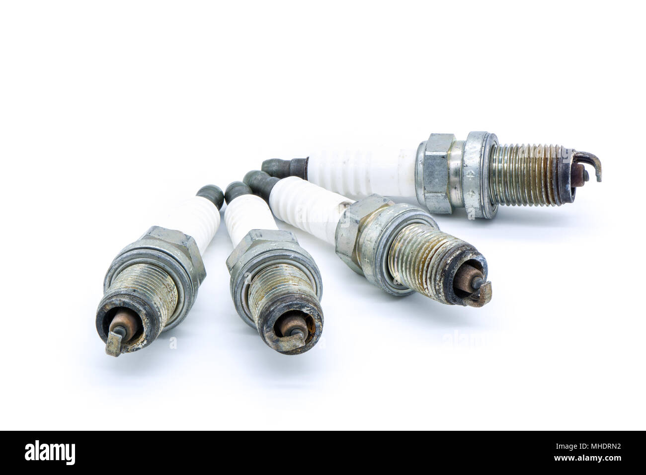 Old spark plug isolated on the white background Stock Photo - Alamy
