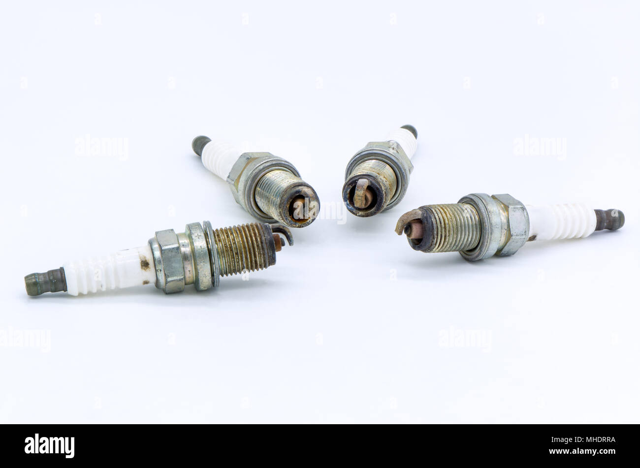 Old spark plug isolated on the white background Stock Photo - Alamy