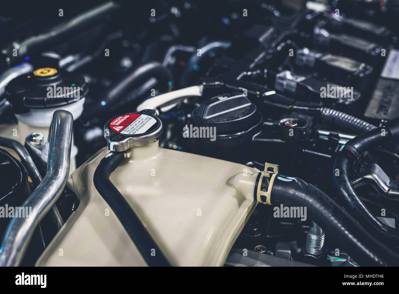 Coolant tank and warning information in engine room Stock Photo - Alamy