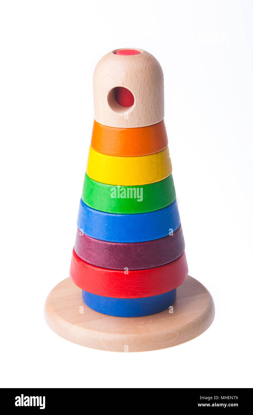 Baby toy. Learning child wood color pyramid toy Stock Photo - Alamy