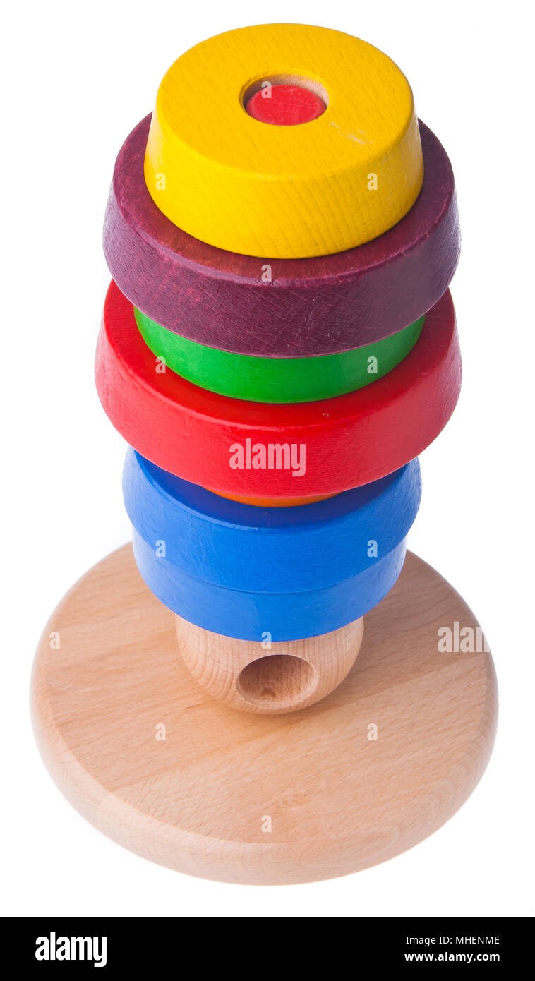 Baby toy. Learning child wood color pyramid toy Stock Photo - Alamy