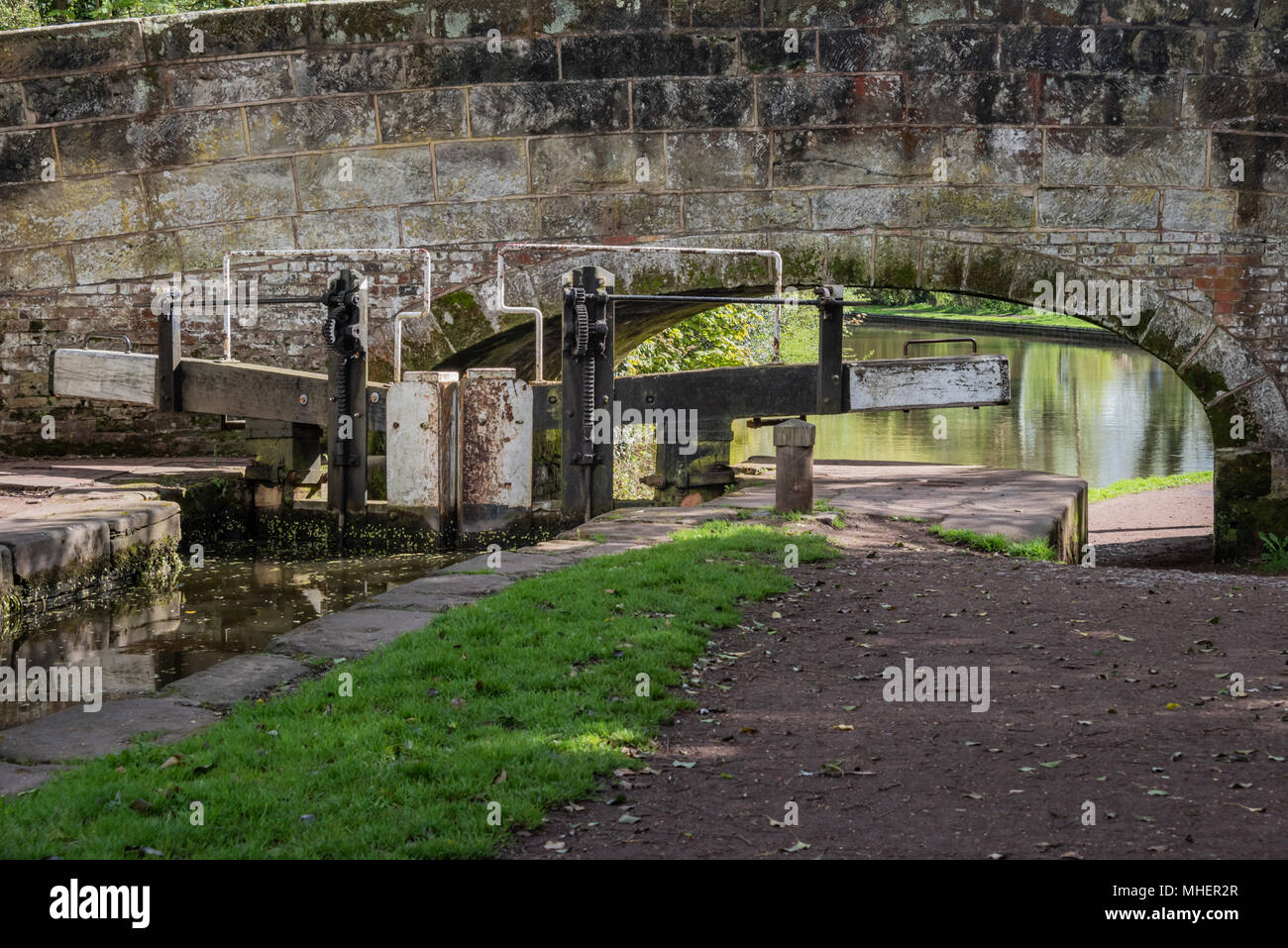 A lock on a canal showing the mechanism which is located by an old ...