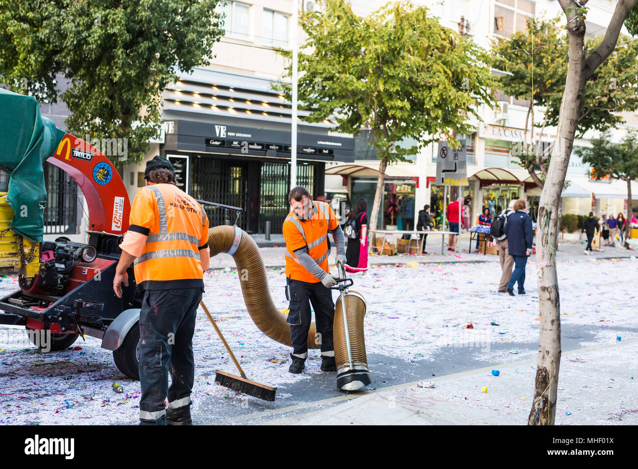 Street sweeper machine cleaning the street after a carnival party Stock ...