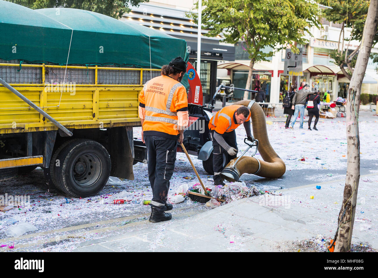 Street sweeper machine cleaning the street after a carnival party Stock ...