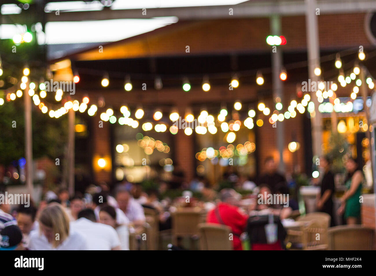 abstract blur image of night festival in a restaurant and The ...