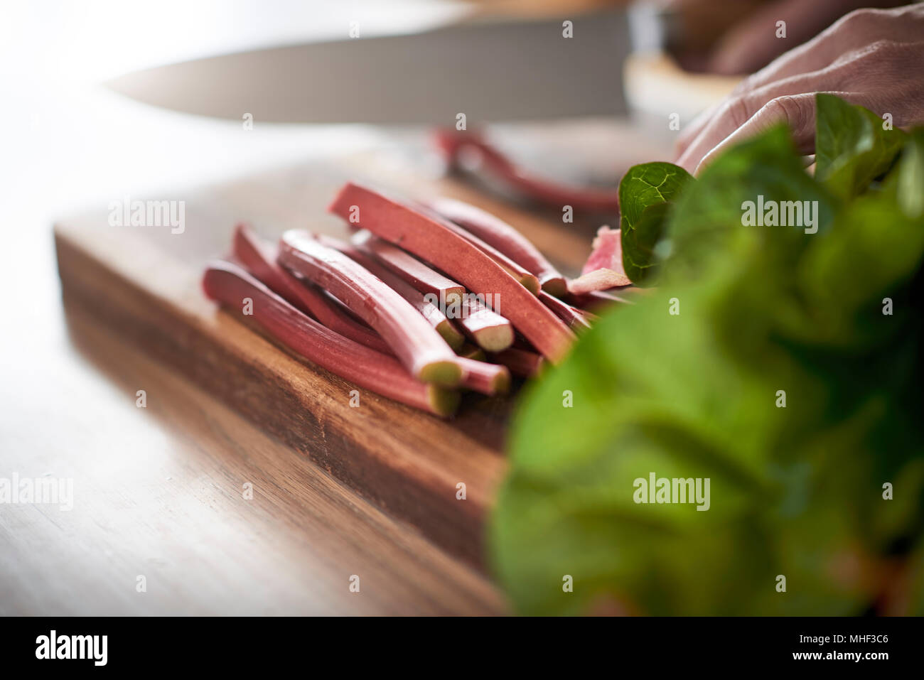 Woman rhubarb kitchen hi-res stock photography and images - Alamy