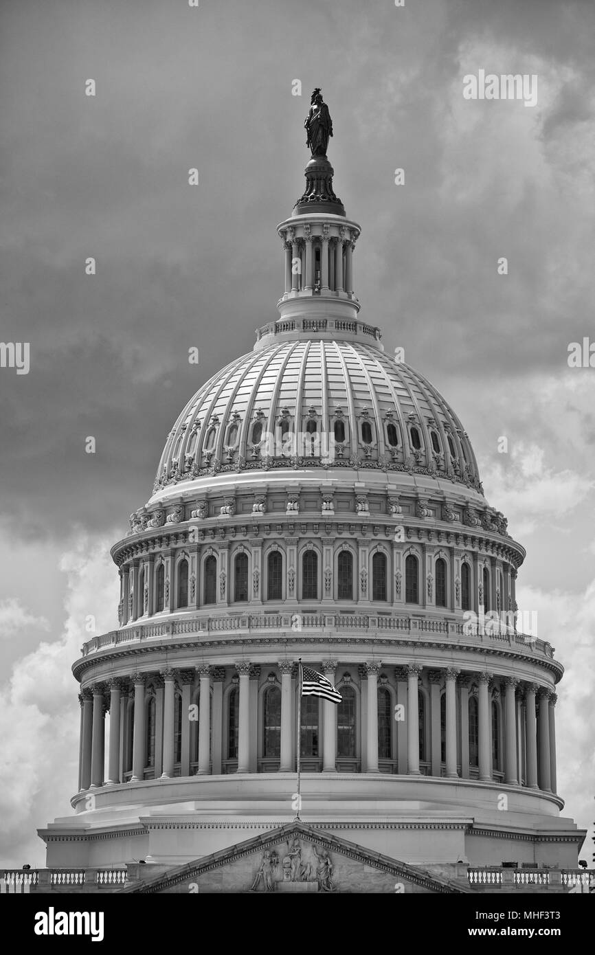 Washington DC Capitol dome detail with waving american flag Stock Photo ...