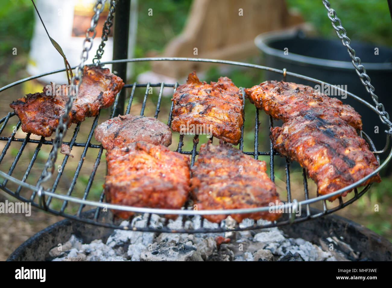 Barbeque outside in the garden Stock Photo - Alamy