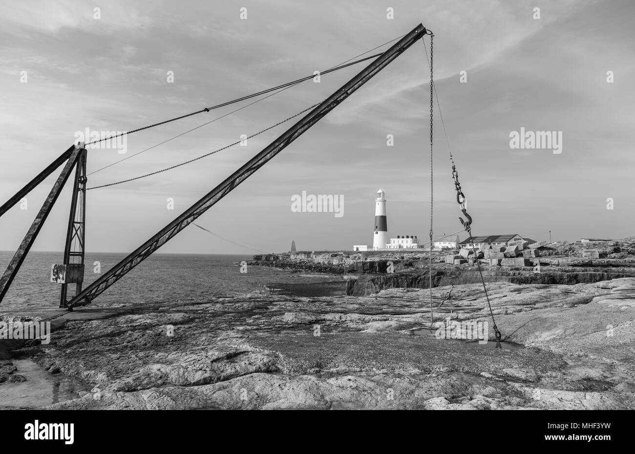 Monochrome Portland Bill Lighthouse, through Rusty old crane rig Stock ...