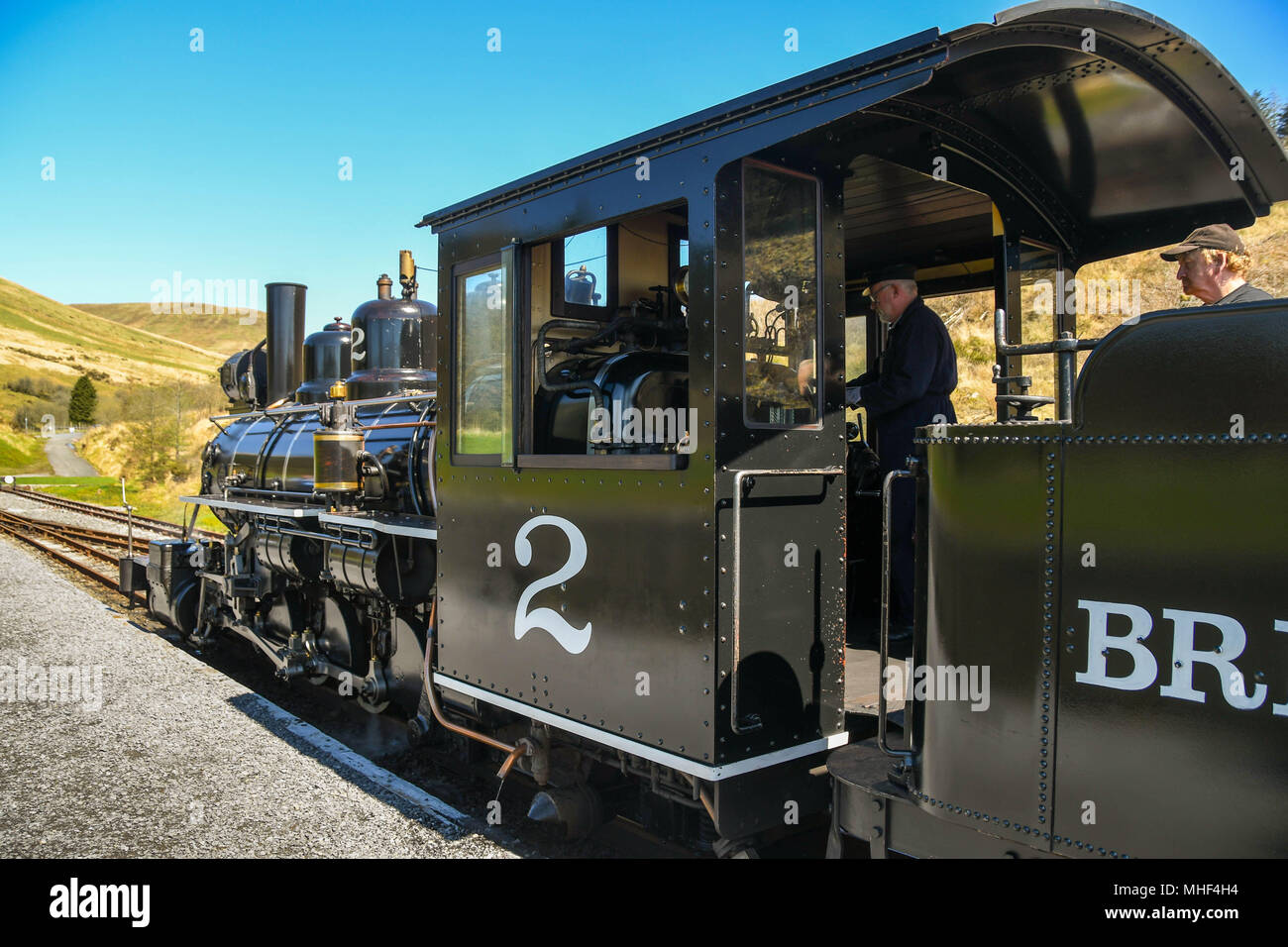 Steam engine on the Brecon Mountain Railway showing cab and driver ...