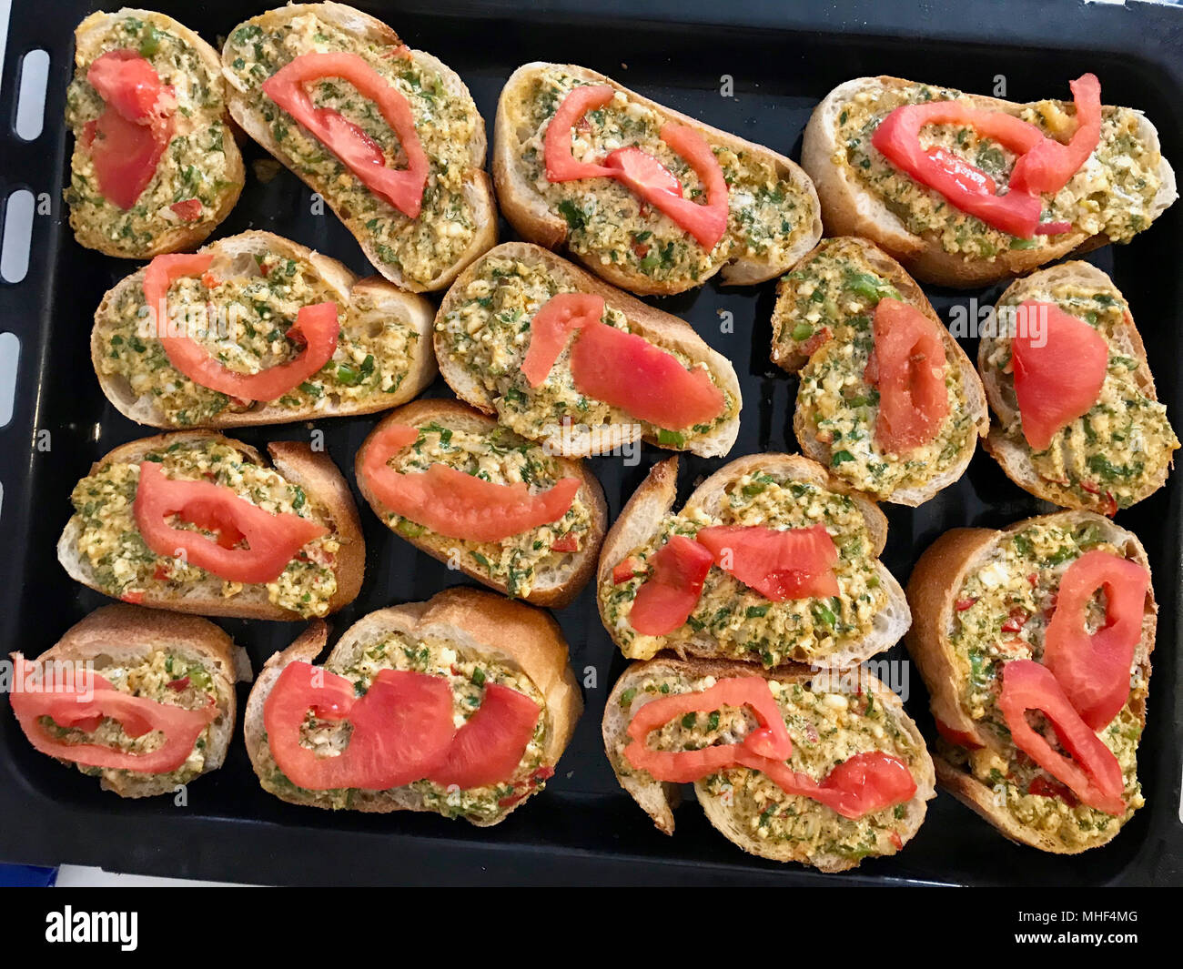 Homemade Fried Garlic Bread Slices with Cheese, Tomatoes and Dill. Fast ...
