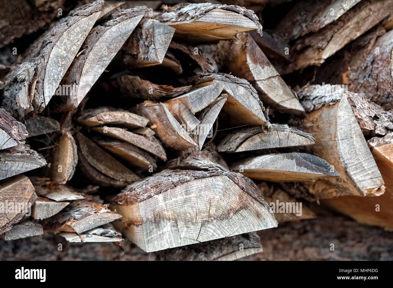 Wood Logs on countryside background Stock Photo - Alamy