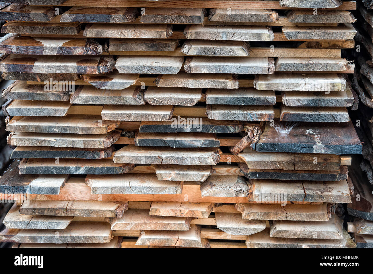 Wood Logs on countryside background Stock Photo - Alamy