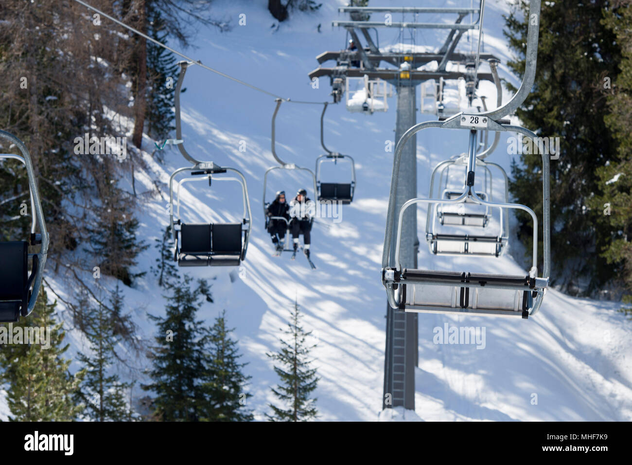 Chair Lift for skiers in winter snow time Stock Photo - Alamy