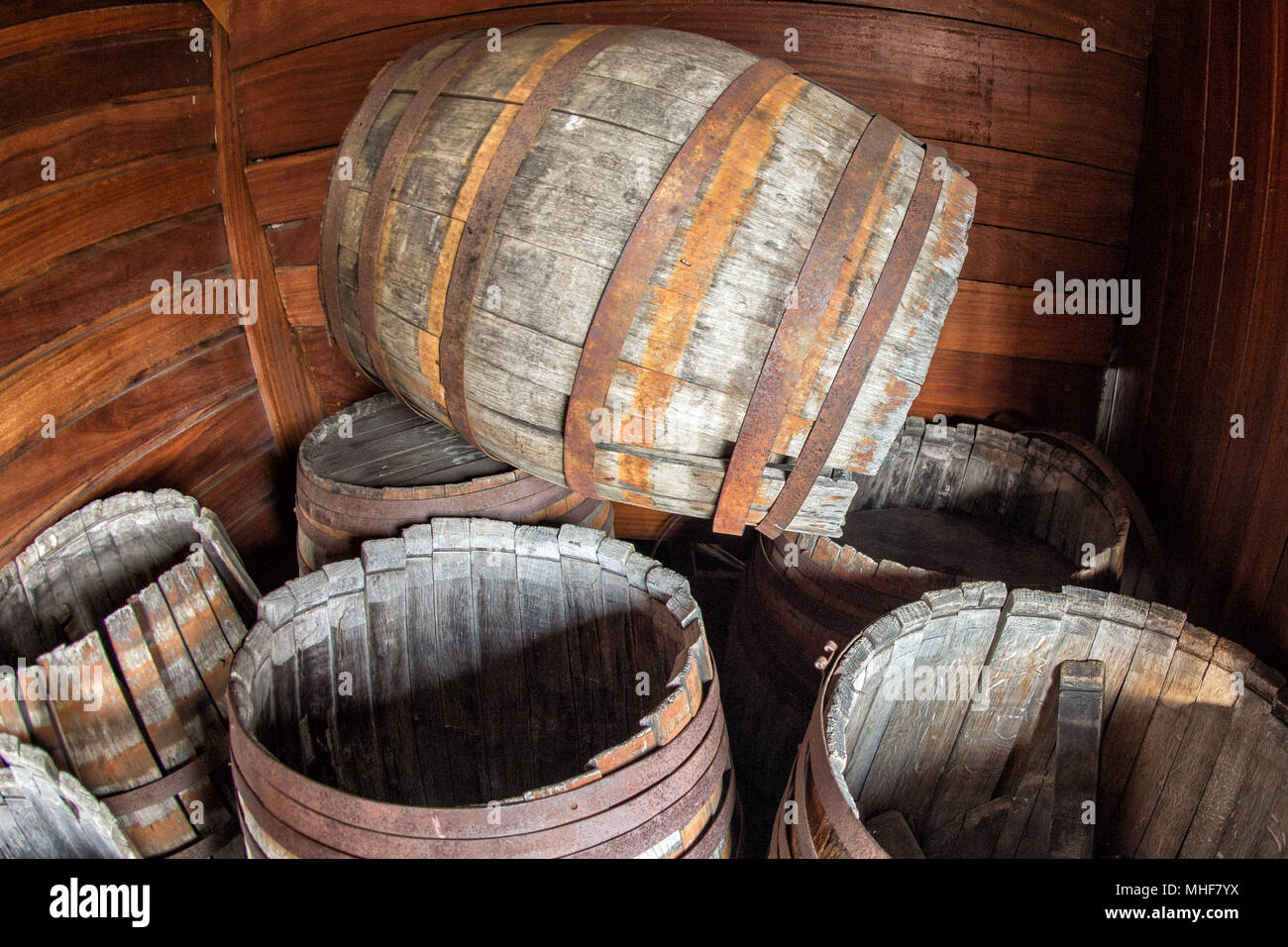 old ruined abandoned wood barrels Stock Photo - Alamy