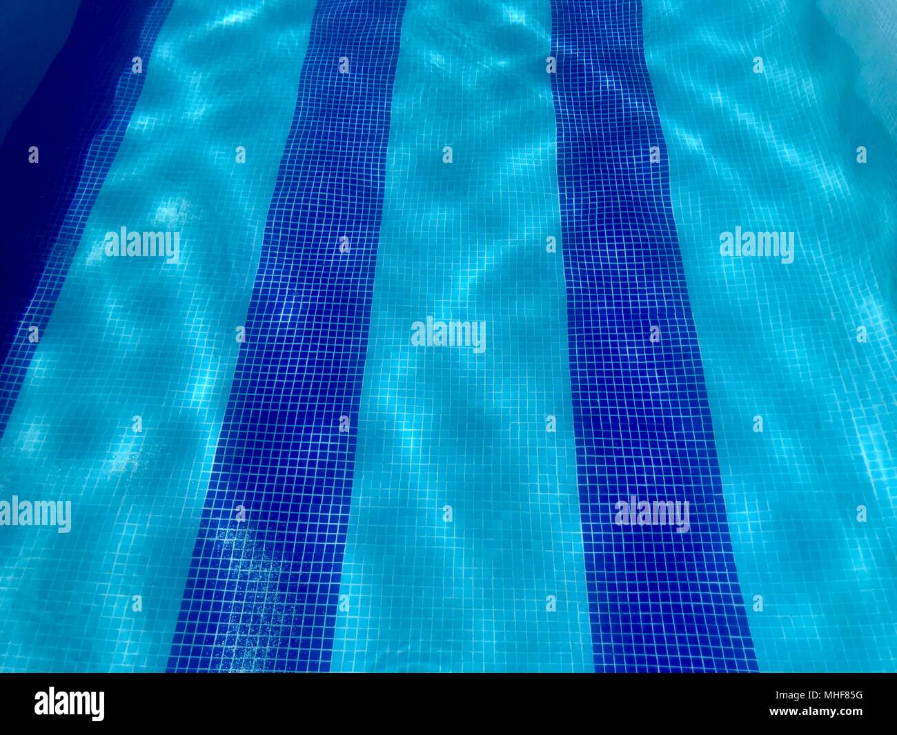 swimming pool blue crystal waters in tropical beach paradise Stock ...