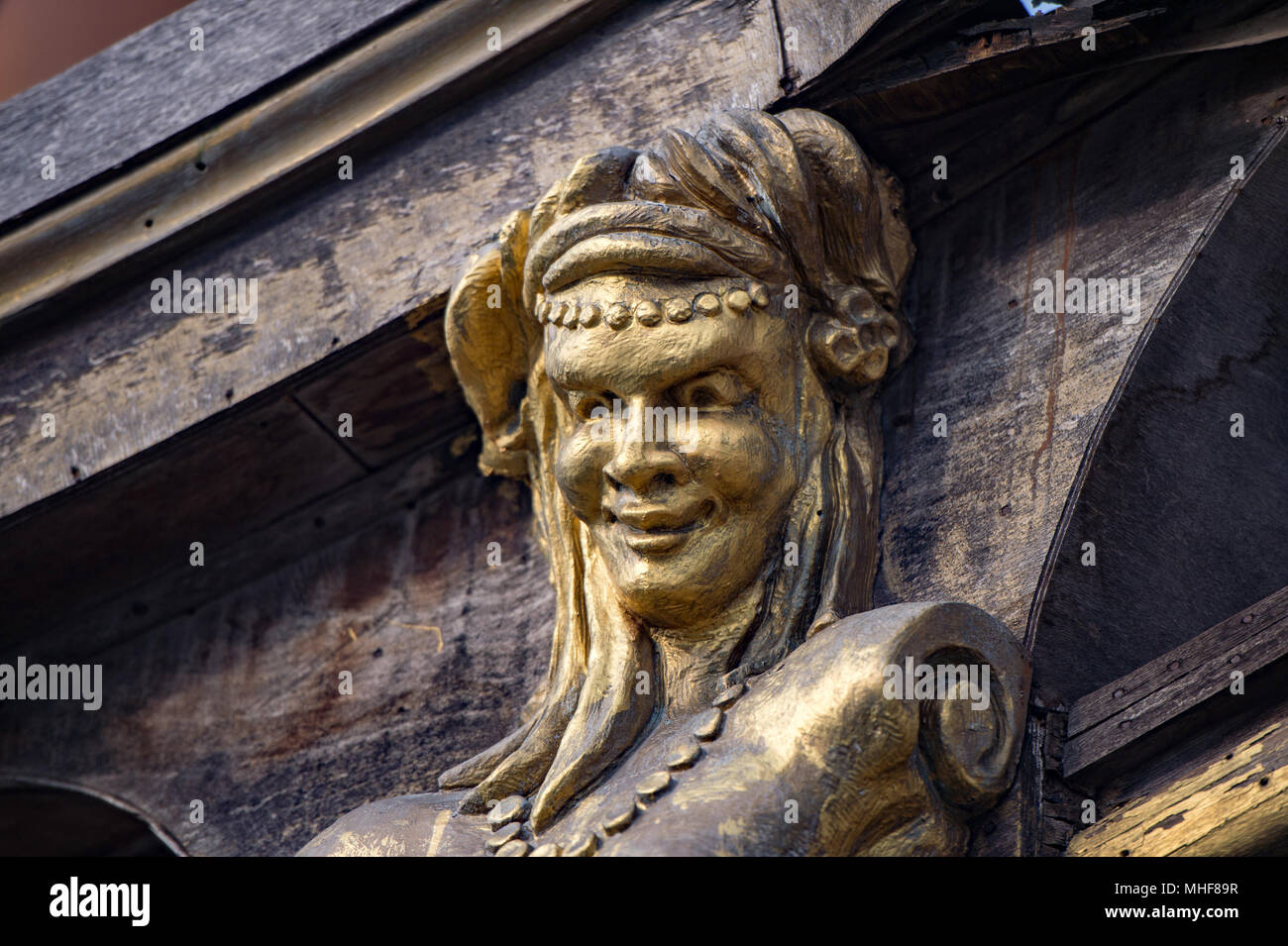 gold statues on pirate sail ship detail Stock Photo - Alamy