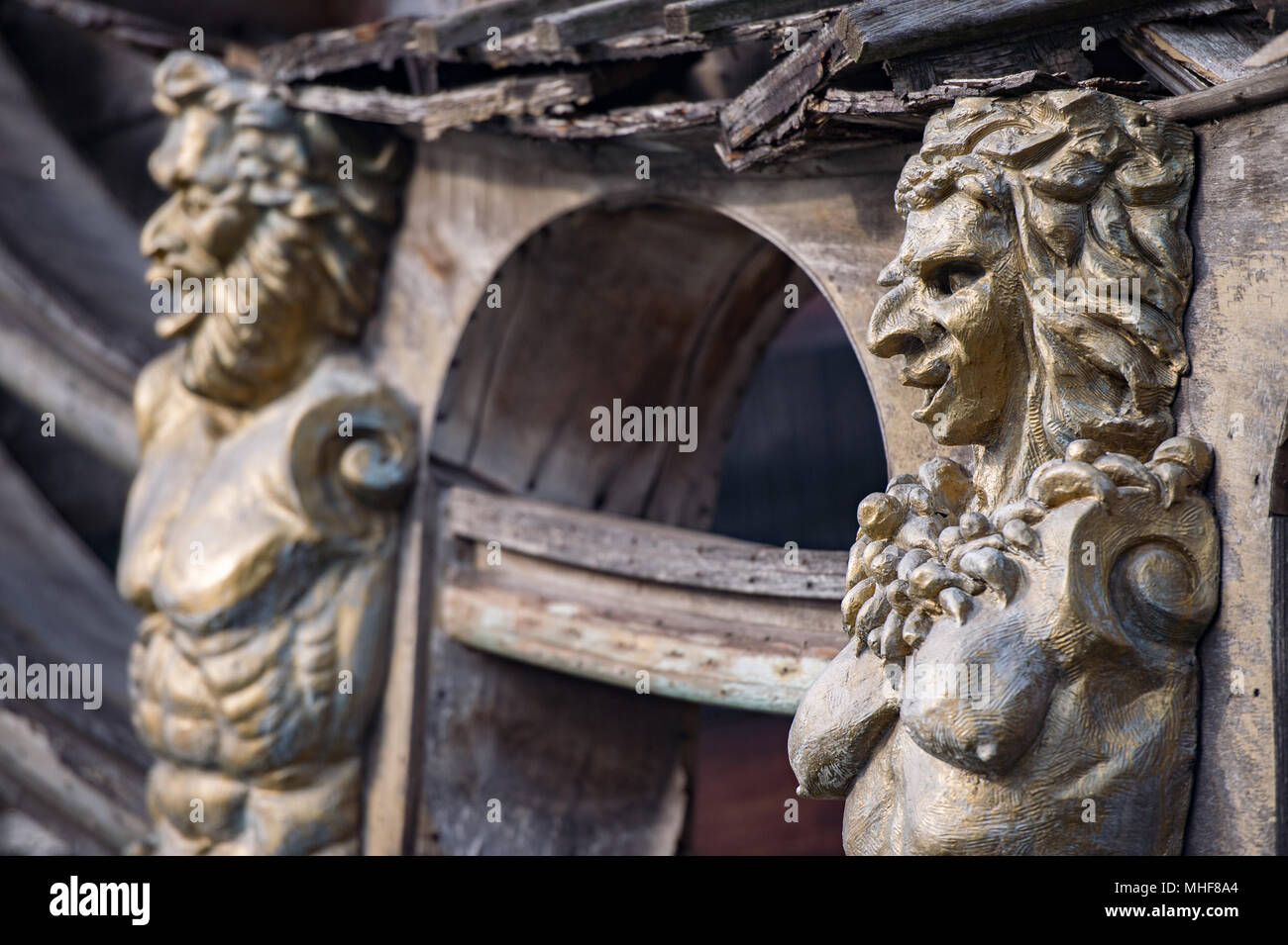 gold statues on pirate sail ship detail Stock Photo - Alamy