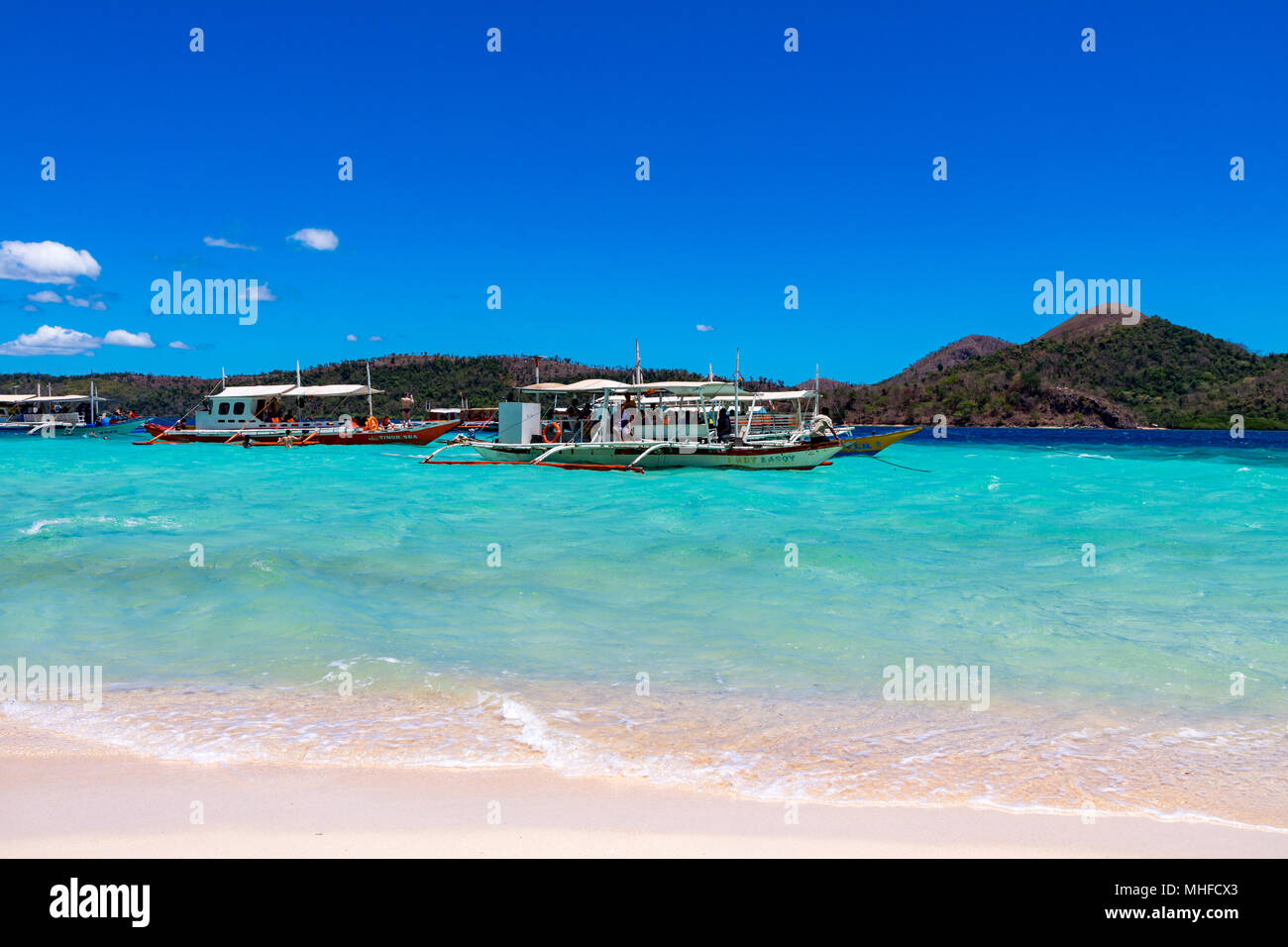 Coron Palawan Philippines April 12, 2018 Pink coral sand on CYC beach ...