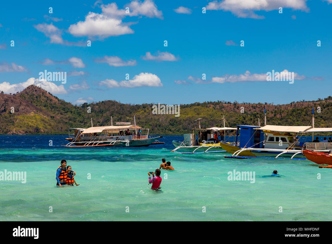Coron Palawan Philippines April 12, 2018 Pink coral sand on CYC beach ...