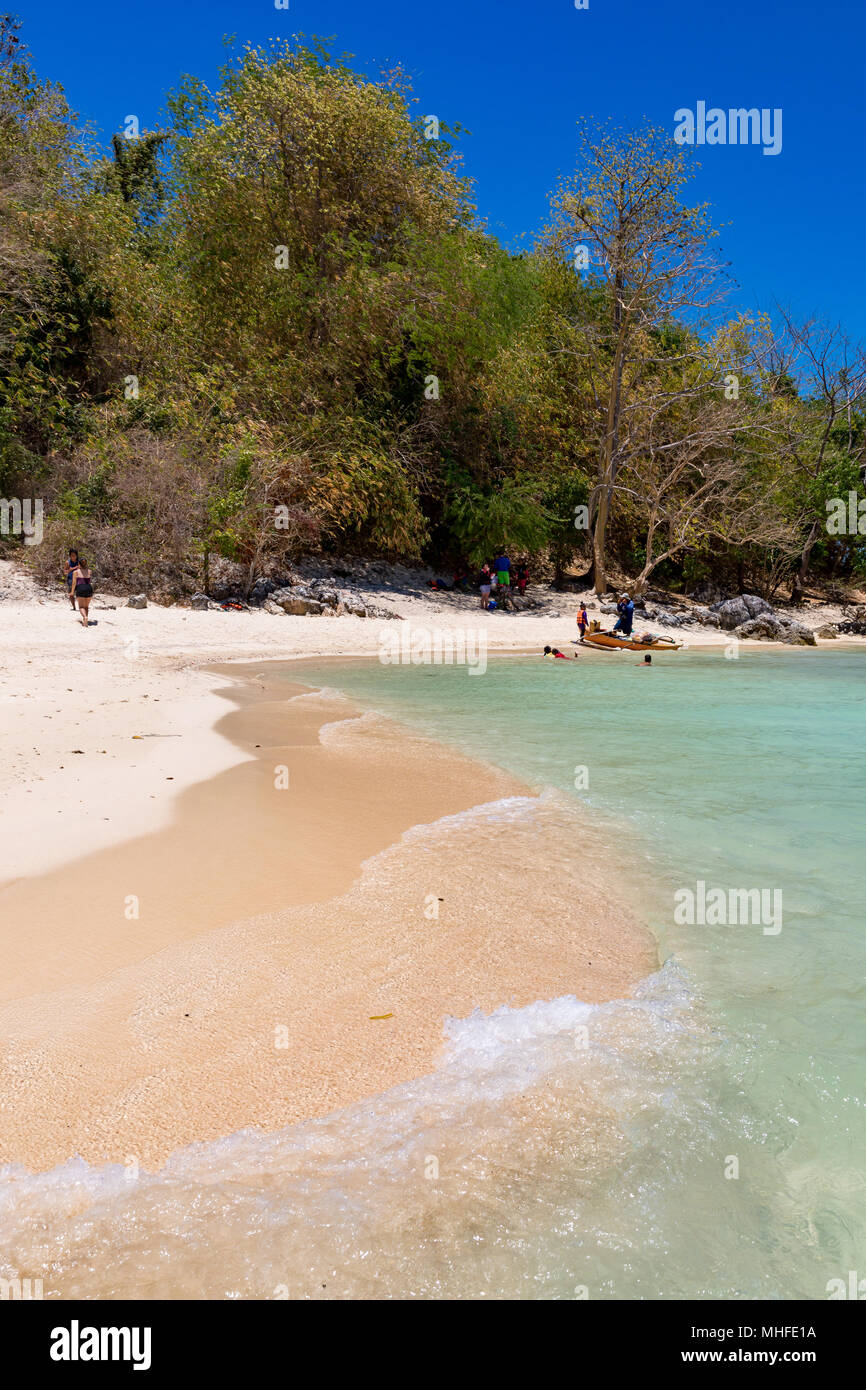 Coron Palawan Philippines April 12, 2018 Pink coral sand on CYC beach ...