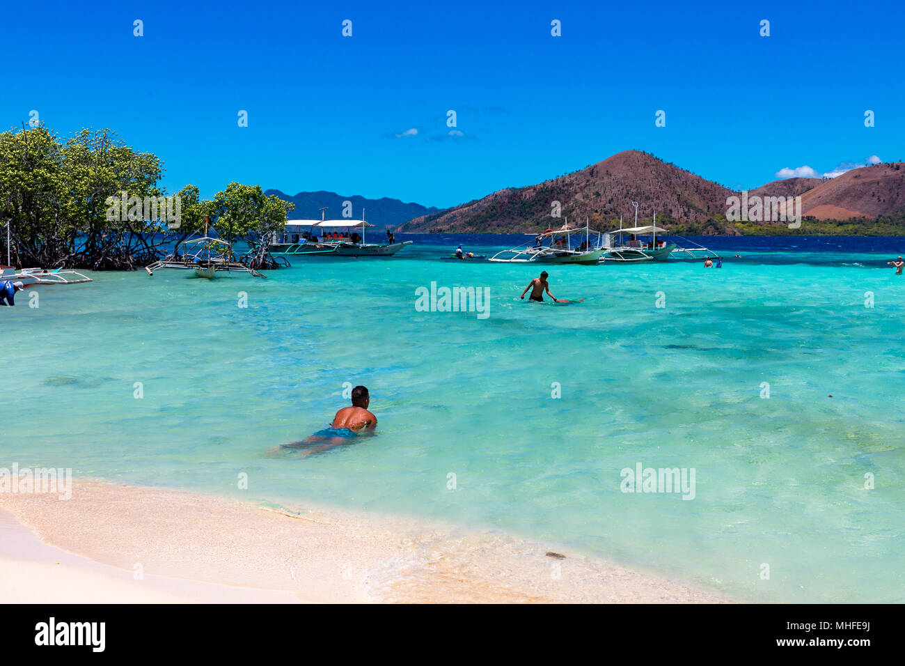 Coron Palawan Philippines April 12, 2018 Pink coral sand on CYC beach ...
