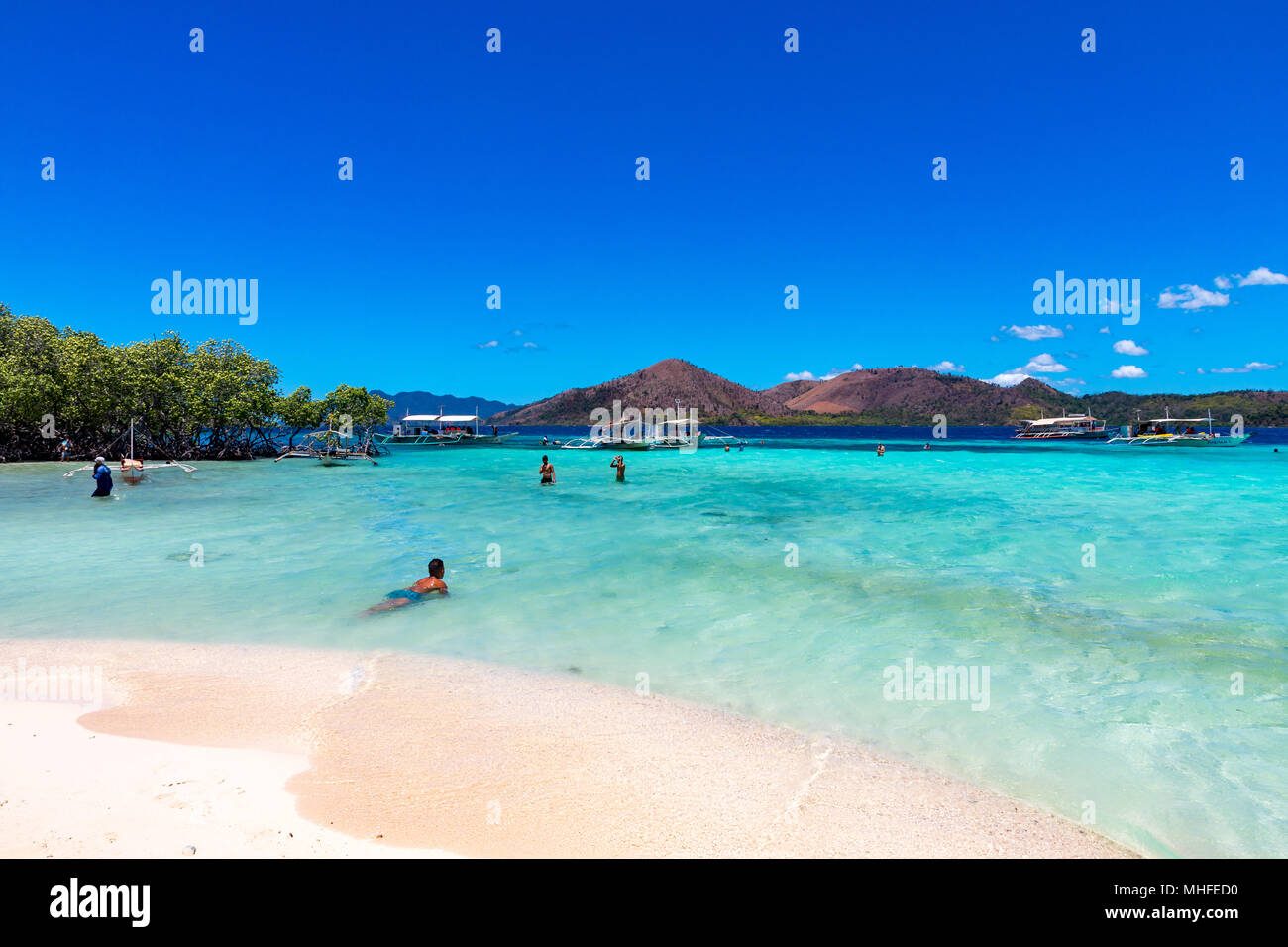 Coron Palawan Philippines April 12, 2018 Pink coral sand on CYC beach ...